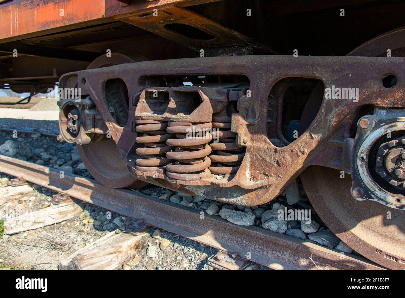 Old metal spring suspension system of trains. Suspension coil spring of ...