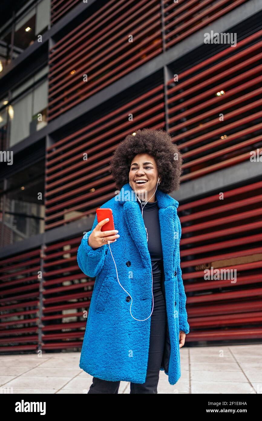 Stock photo of beautiful african american girl using mobile phone and ...