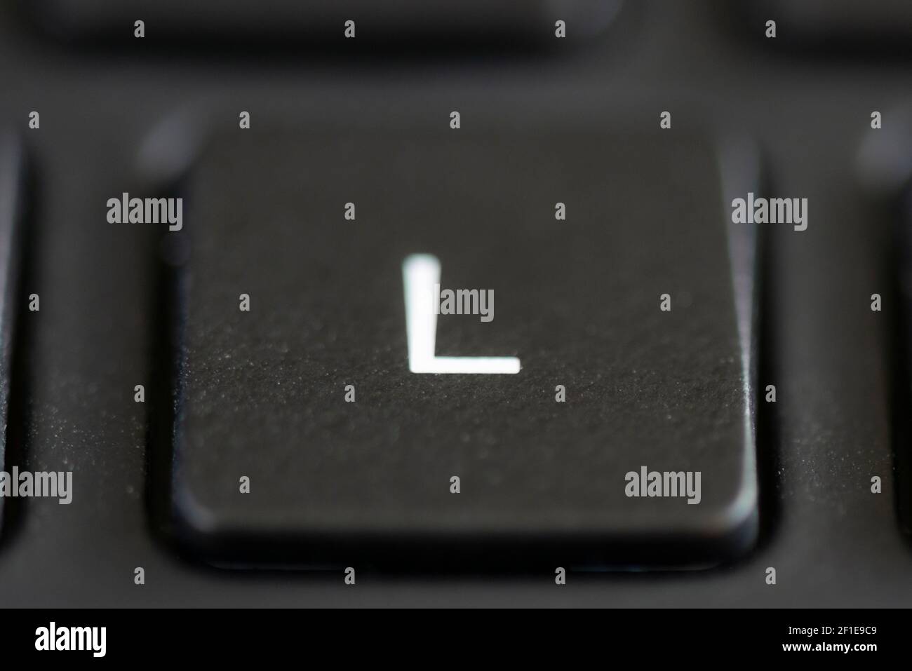 L key on a laptop keyboard Stock Photo - Alamy