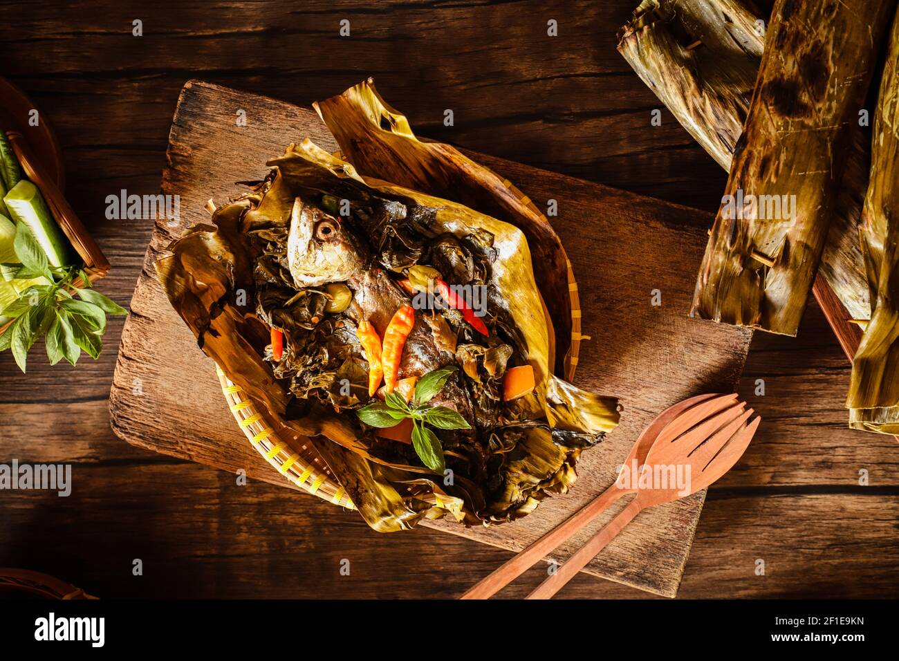 Pepes Ikan Peda. Salted Peda Fish with Cassava Leaf in Banana Leaf ...