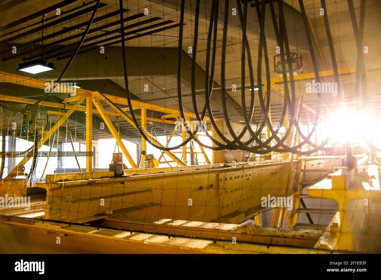 Inside a yellow construction site building Stock Photo - Alamy