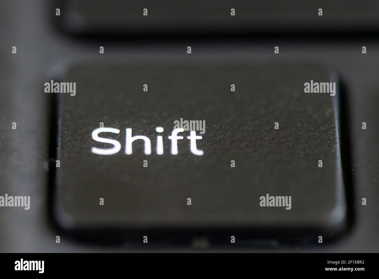 Shift key on a laptop keyboard Stock Photo - Alamy
