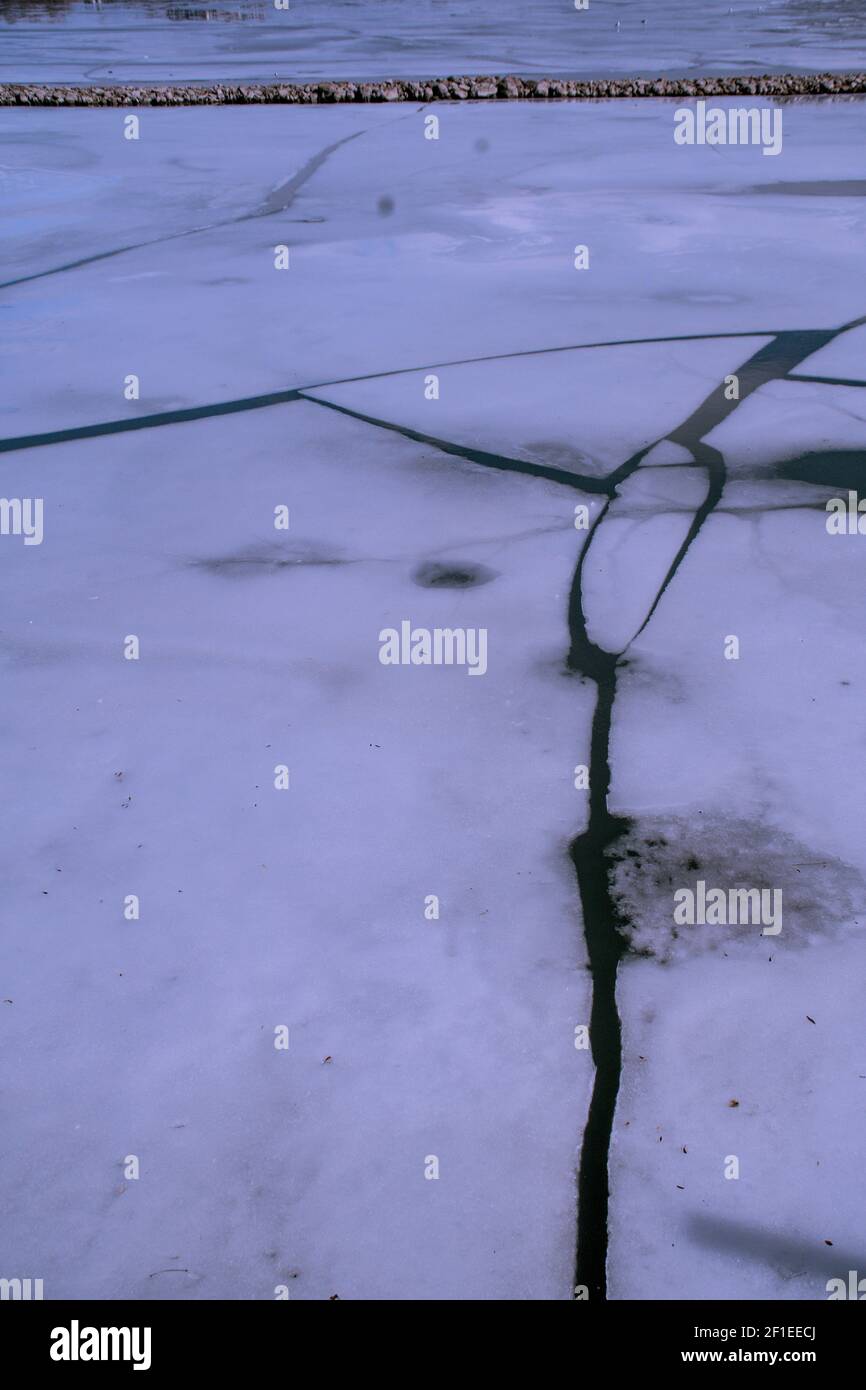 Cracked lake ice Stock Photo - Alamy