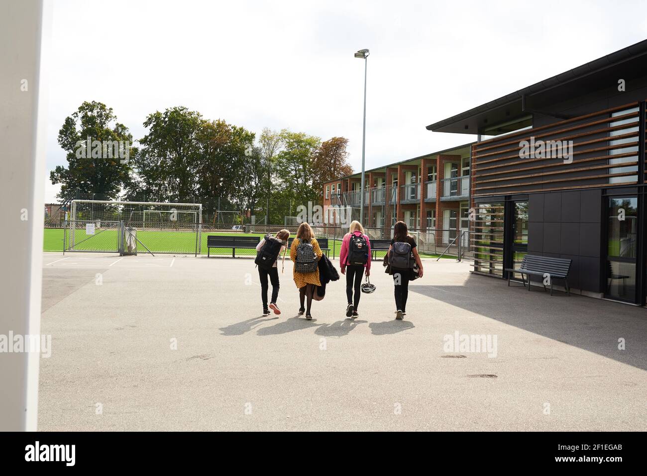 A group of school girls walking to school Stock Photo - Alamy