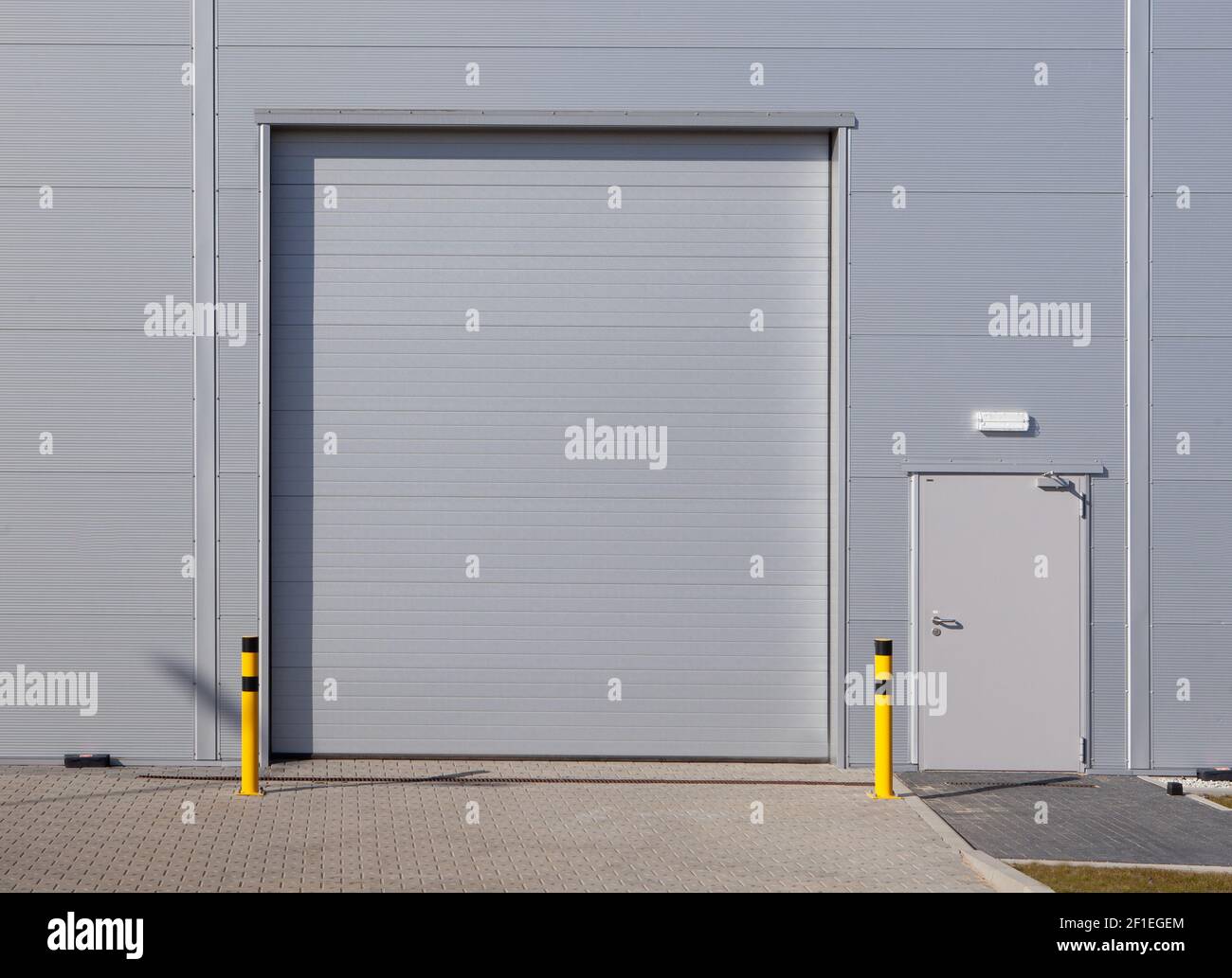 Modern garage gates - steel shutter door Stock Photo - Alamy