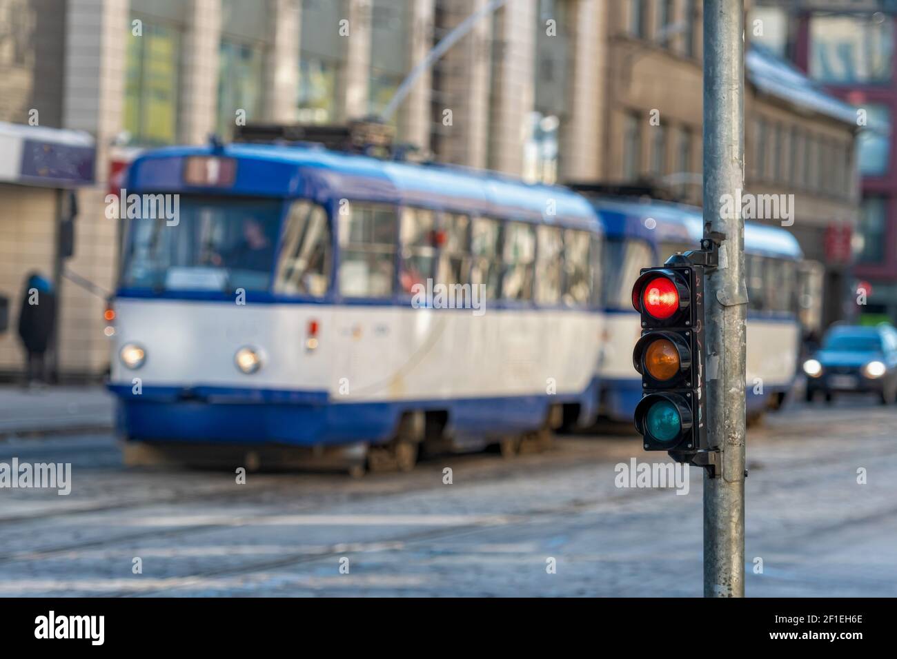 close-up of small traffic semaphore with red light against the backdrop ...