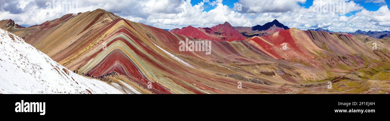 Rainbow mountains or Vinicunca Montana de Siete Colores with people ...