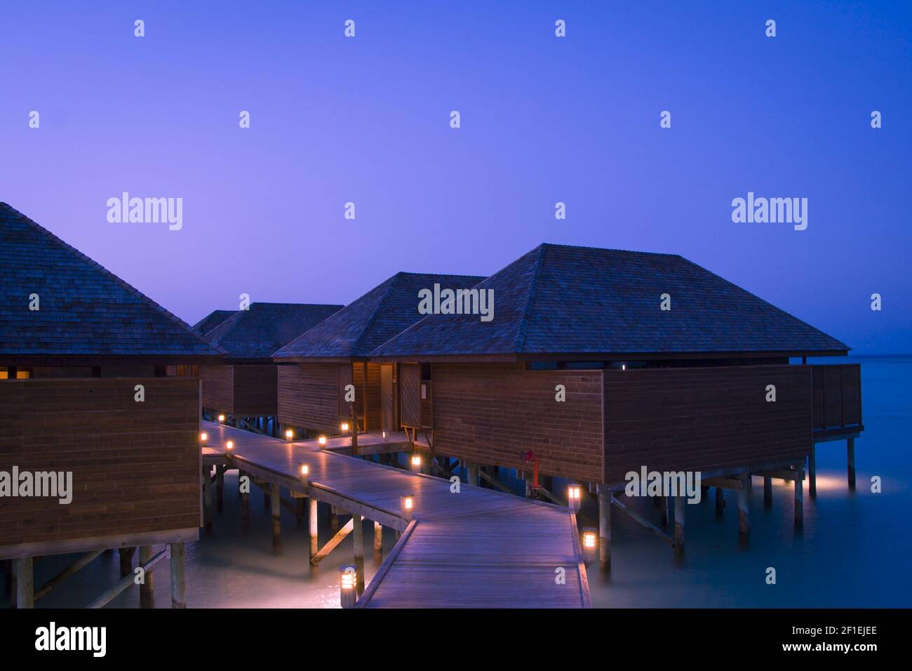 Tropical resort at the blue hour Stock Photo - Alamy