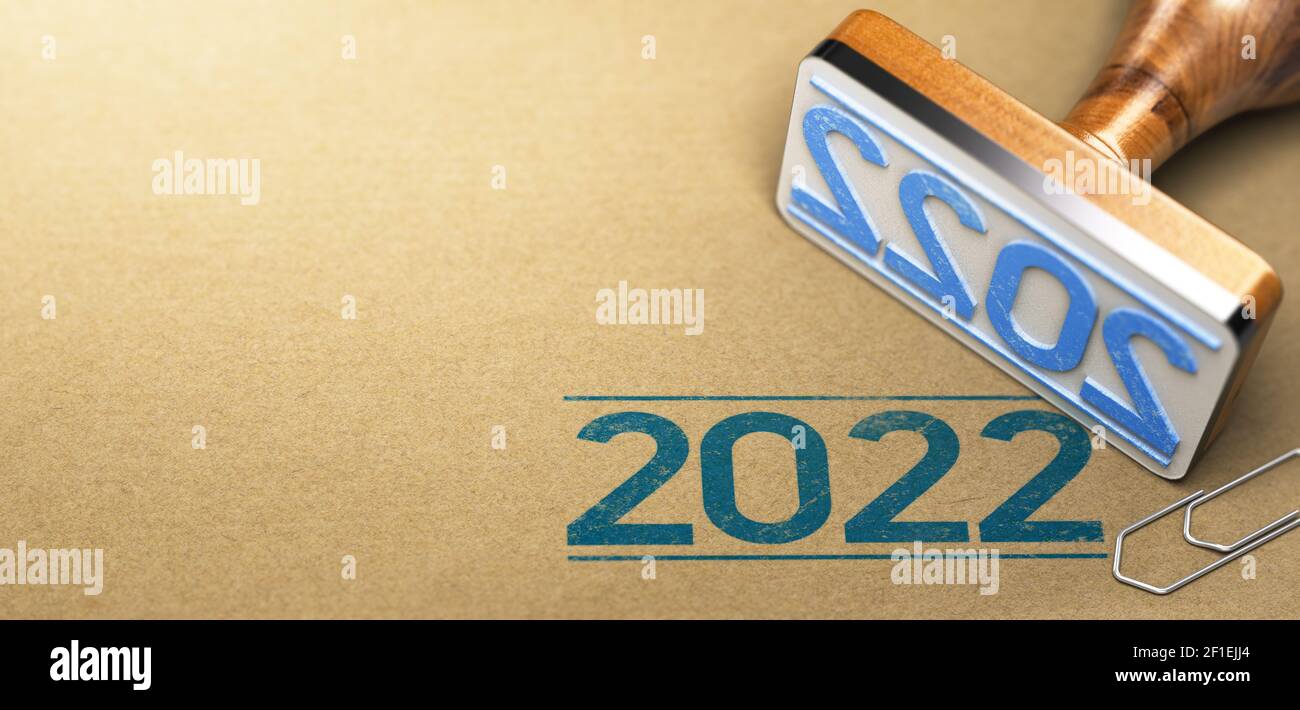 Rubber stamp with the year 2022 printed on a brown paper background ...
