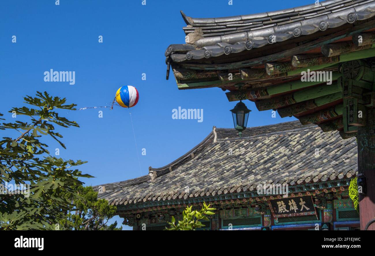 Asian air balloon and roof detail Stock Photo - Alamy