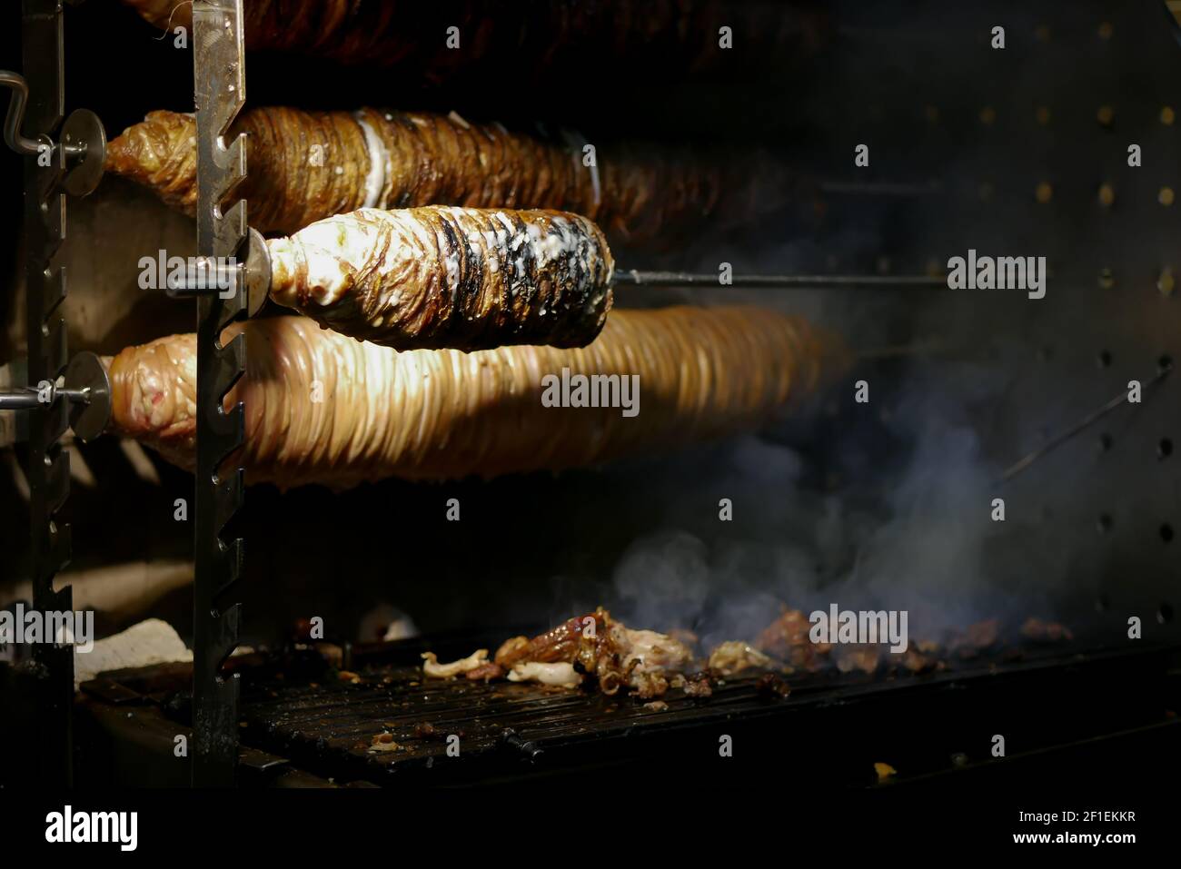 Kokorec grill, a Turkish lamb intestines delicacy Stock Photo - Alamy