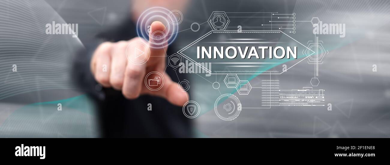 Man touching an innovation concept on a touch screen with his finger ...