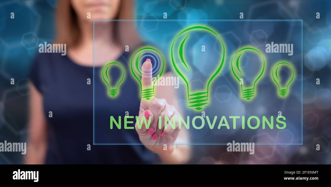 Woman touching a new innovations concept on a touch screen with her ...