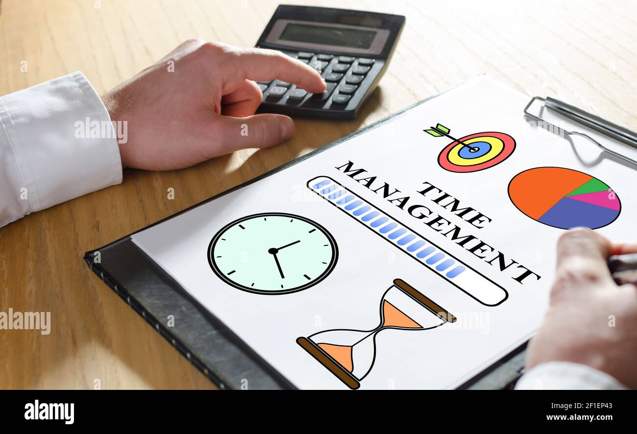 Time management concept with hand using a calculator Stock Photo - Alamy
