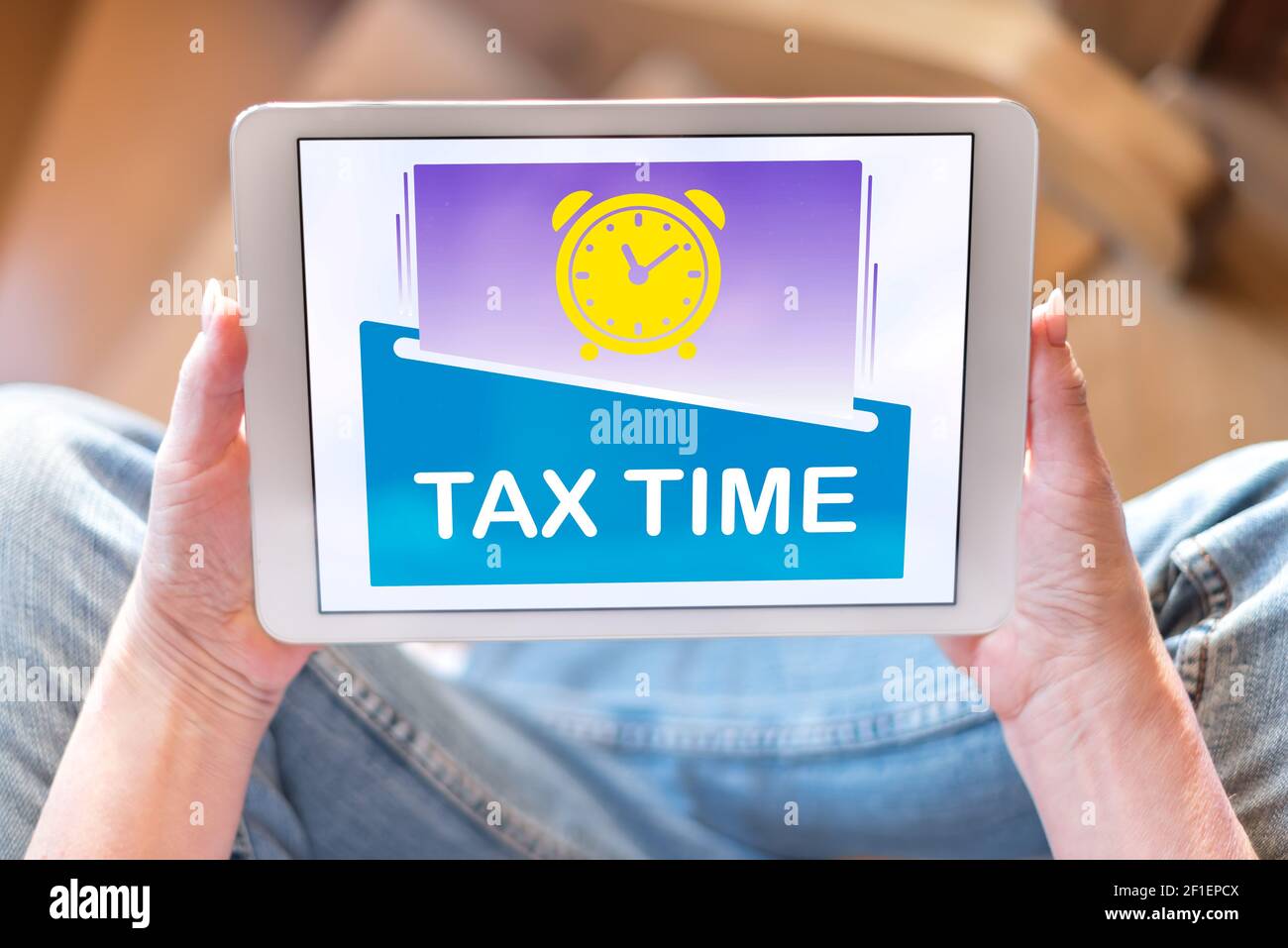 Tablet screen displaying tax hi-res stock photography and images - Alamy
