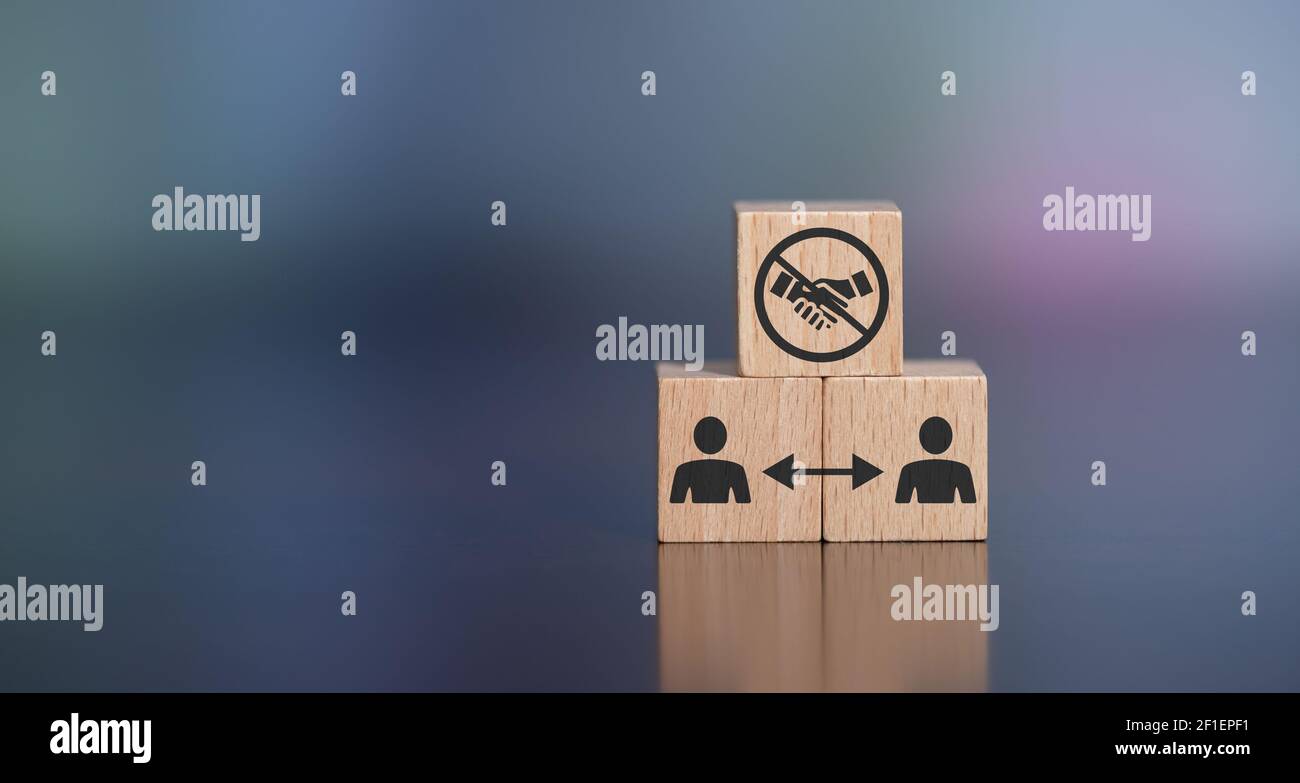 Concept of infection prevention on wooden cubes; social distancing ...