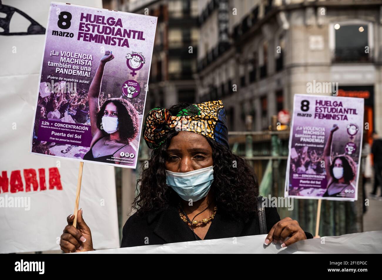 Madrid, Spain. 08th Mar, 2021. A woman protesting with placards during ...