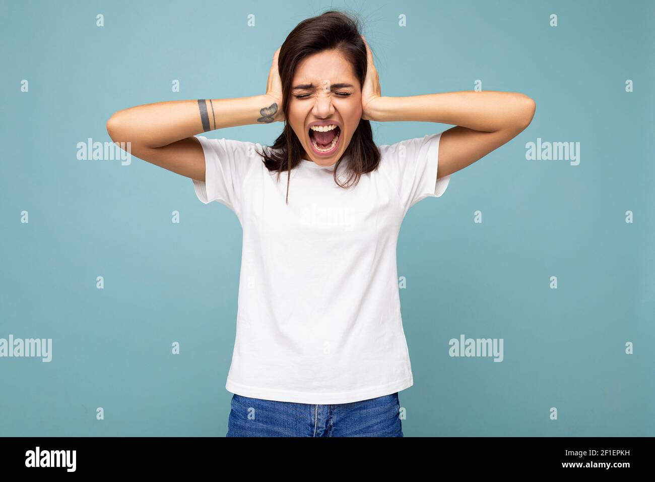 Portrait of emotional young beautiful brunette woman with sincere ...