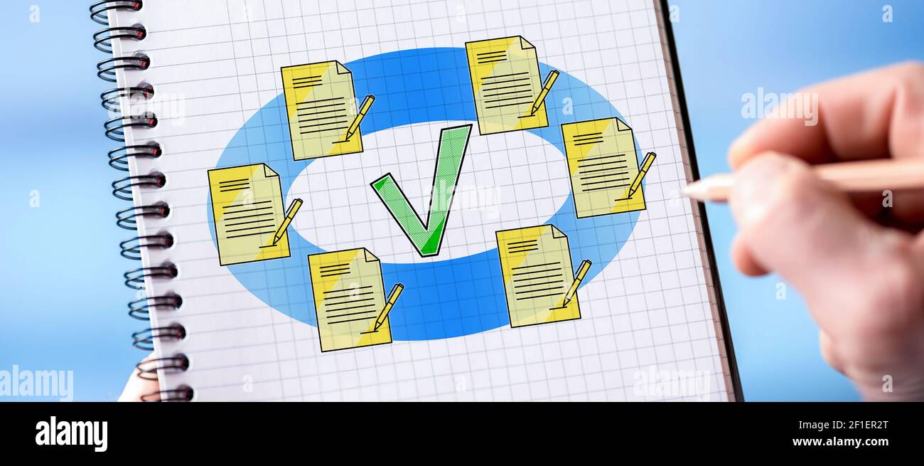 Hand drawing document validation concept on a notepad Stock Photo - Alamy