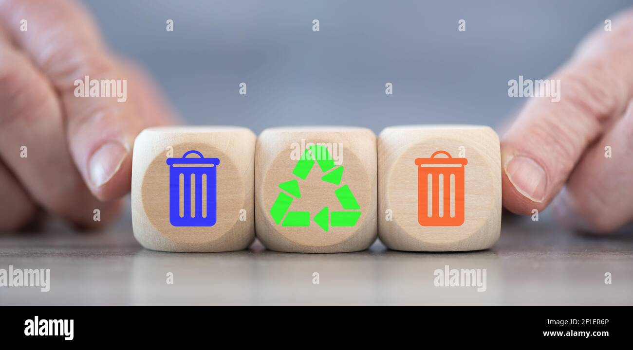 Concept of recycling with wooden cubes Stock Photo - Alamy