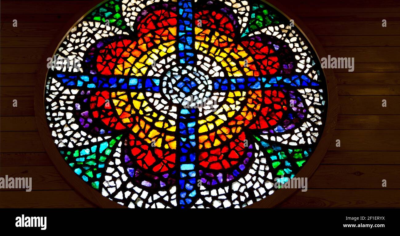 In the sanctuary the colorful rose window Stock Photo - Alamy