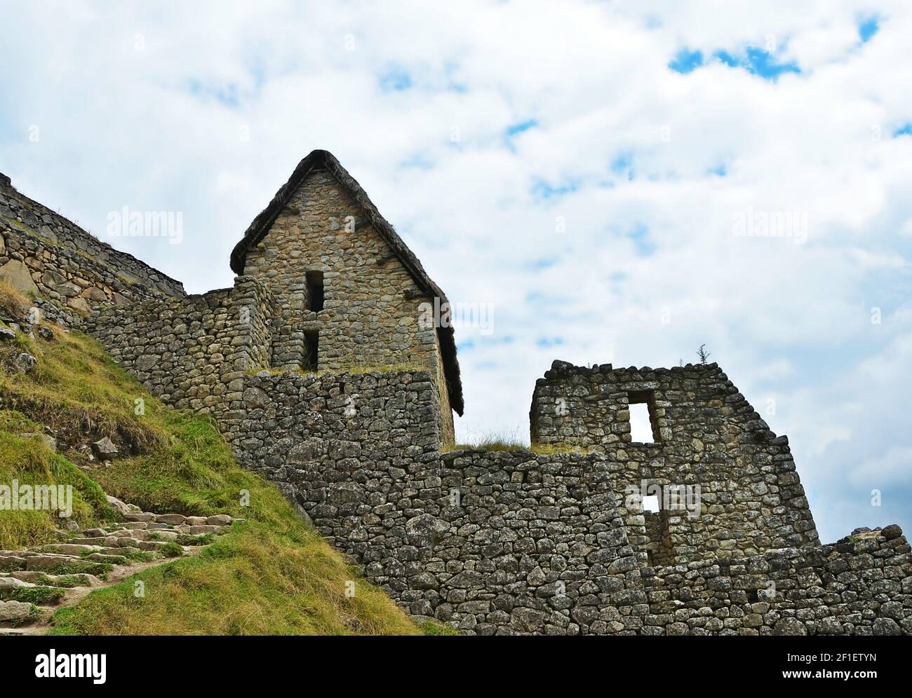 Dry-stone huts with the thatched roofs at Machu Picchu, the Inca ...