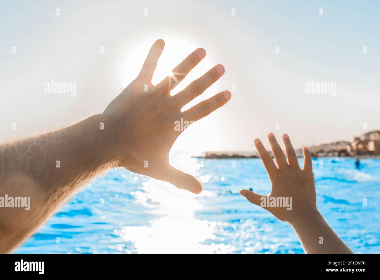 The silhouette of the man's hands and the chewing arms waving against ...