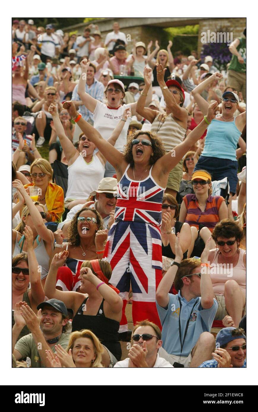 Tim Henman out of this years wimbledon Crouds watch on Henman Hillpic ...