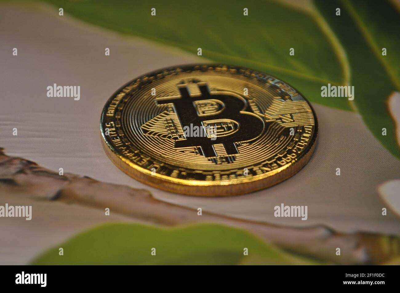 Macro view of gold and silver color shiny coins with Bitcoin symbol ...