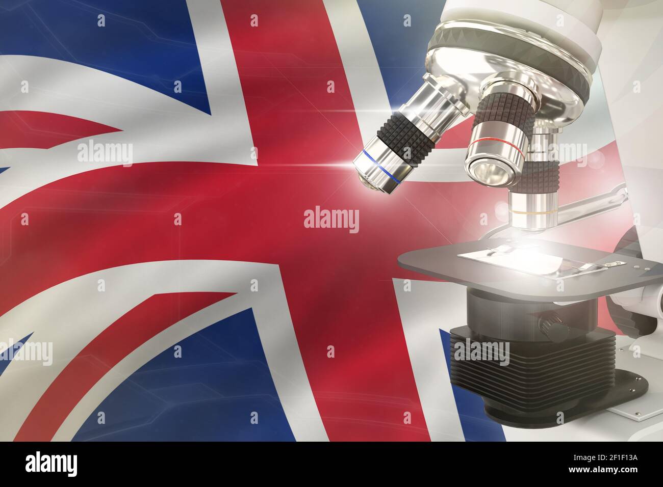 United Kingdom (UK) science development concept - microscope on flag ...