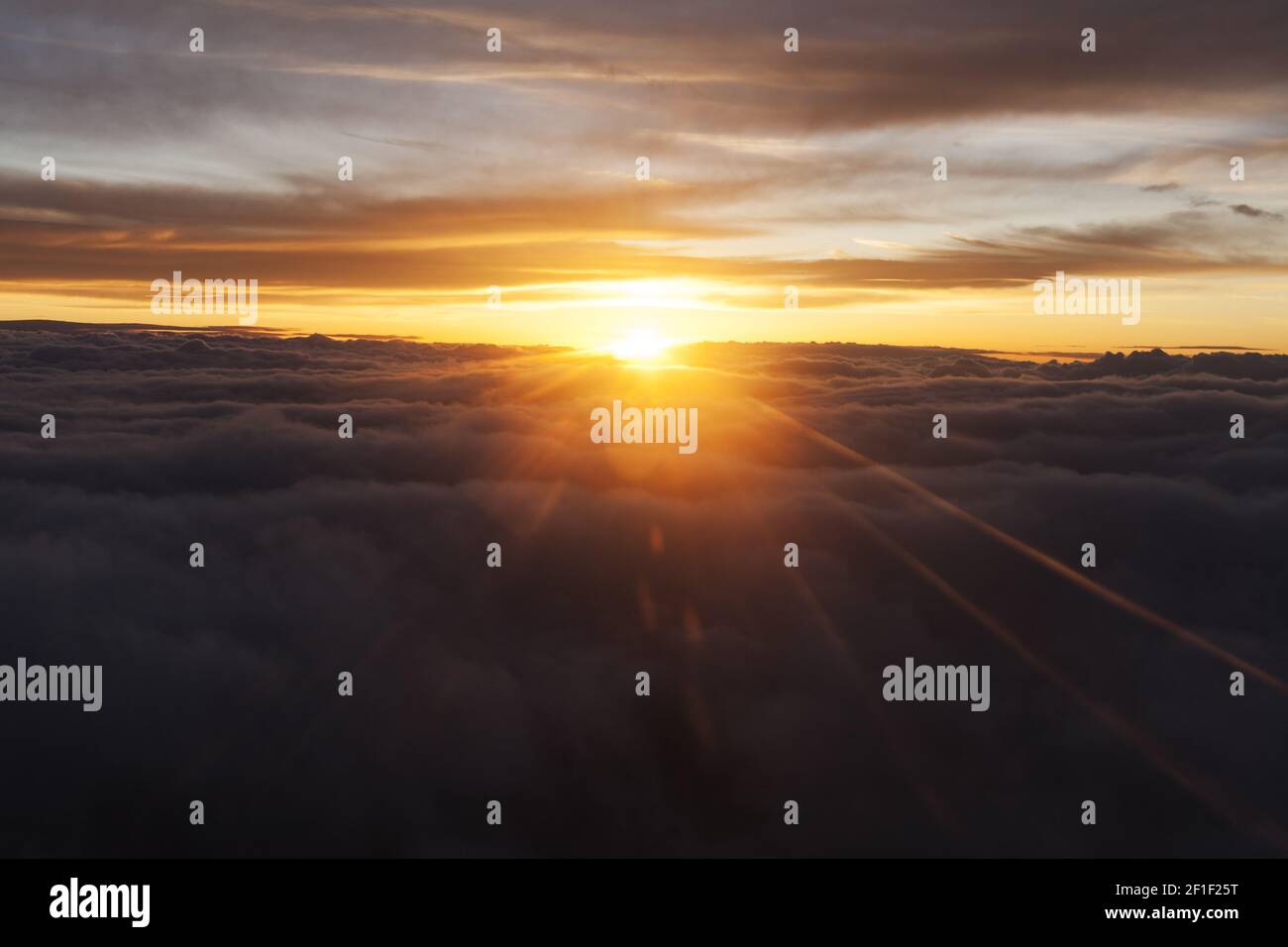 Sun Between Clouds Stock Photo - Alamy
