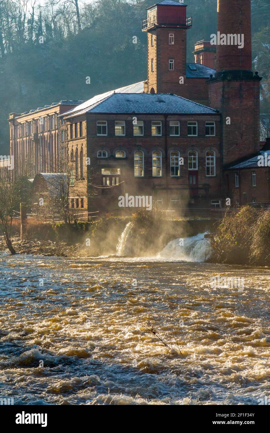 Winter view of Masson Mill and River Derwent at Matlock Bath a hillside ...