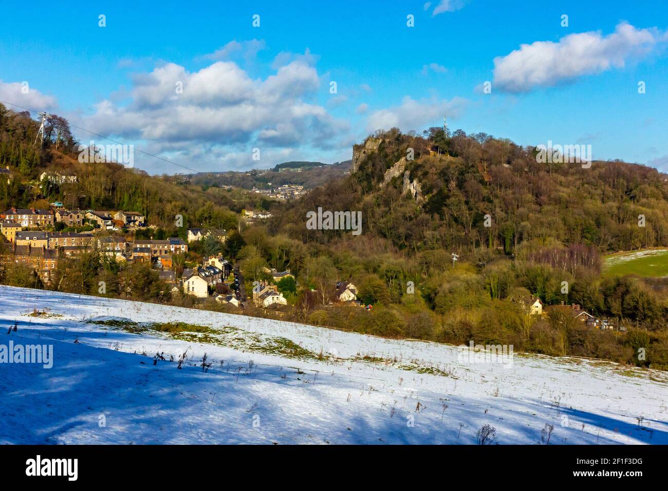 Snow covered landscape with trees overlooking High Tor near Matlock ...