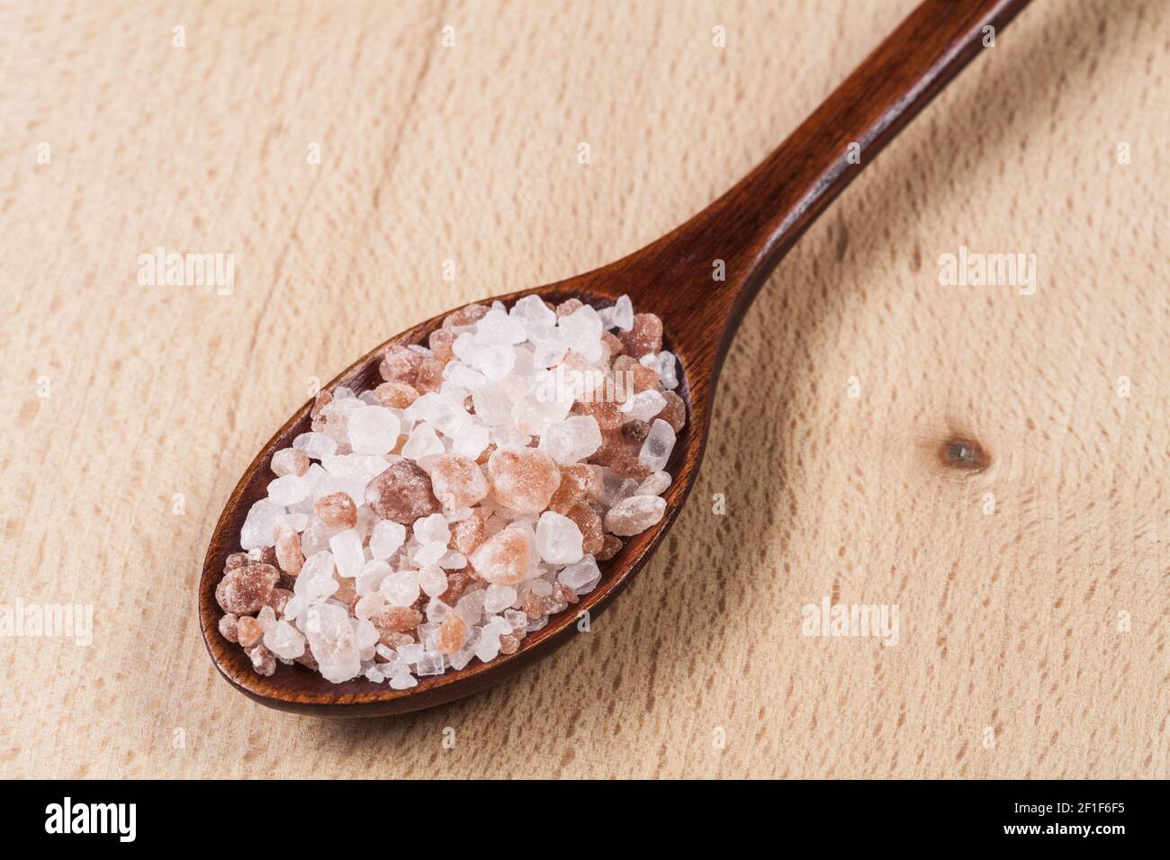 Salt on Spoon Stock Photo - Alamy