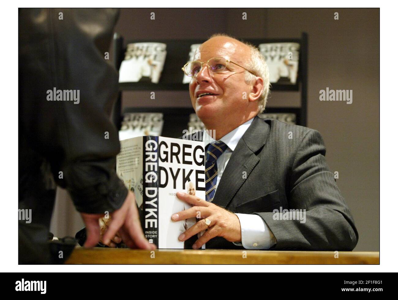 Greg Dyke signs copies of his new book in the BBC's canteen bookshop ...