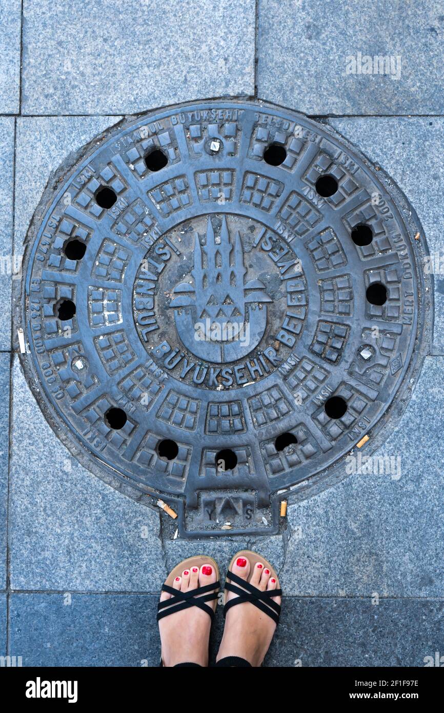 Metal round sewer manhole in Istanbul. Turkey , Istanbul - 21.07.2020 ...