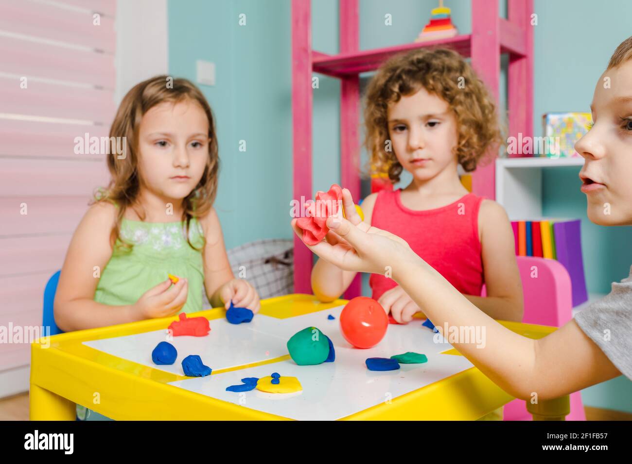 the child enjoys his work at the kindergarten Stock Photo - Alamy