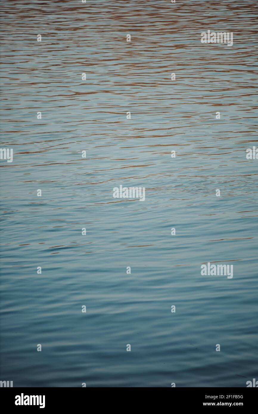 Calm peaceful lake with the blue sky reflecting in the water Stock ...