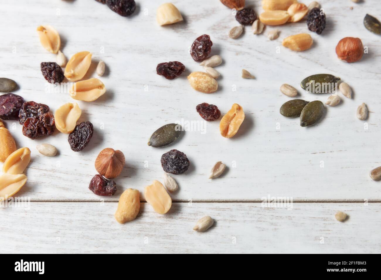 set of dried fruits with wood background Stock Photo - Alamy