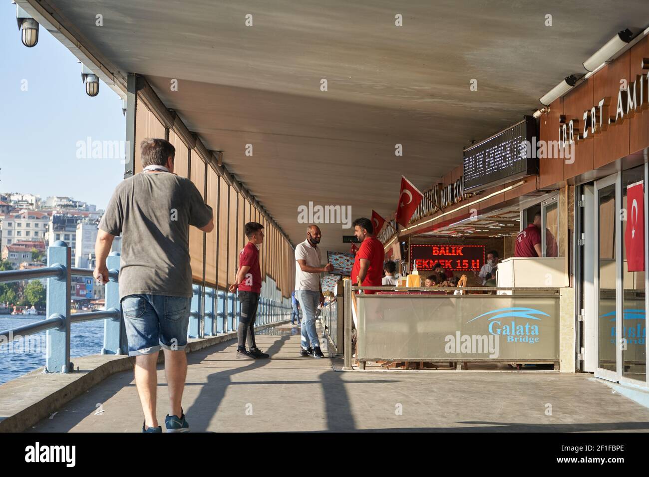Walking tour of istanbul. The pedestrian part of the Galata bridge. A ...