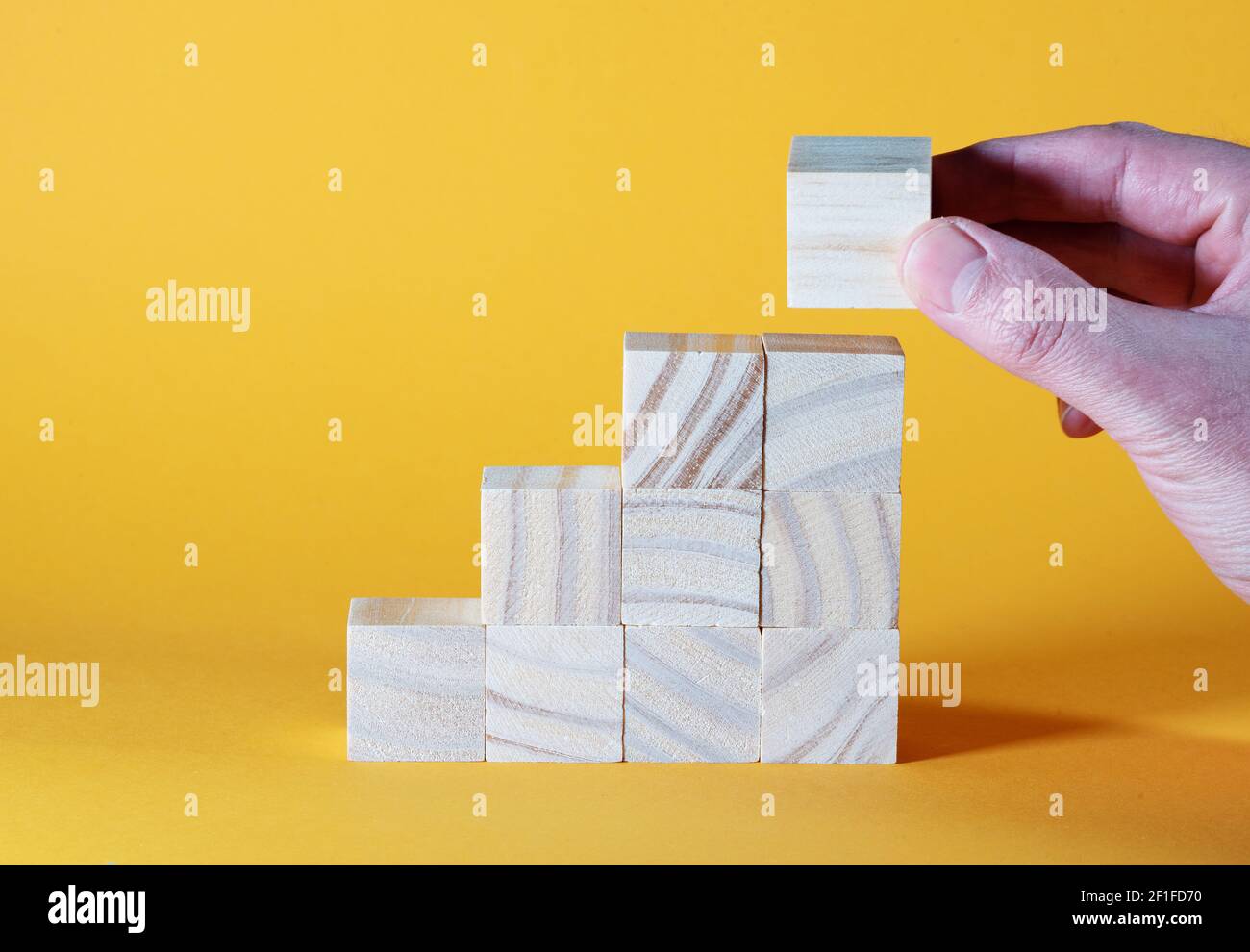 Stacking blocks hi-res stock photography and images - Alamy