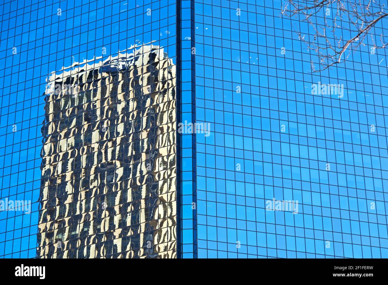 The reflex of the skyscraper in the window Stock Photo - Alamy