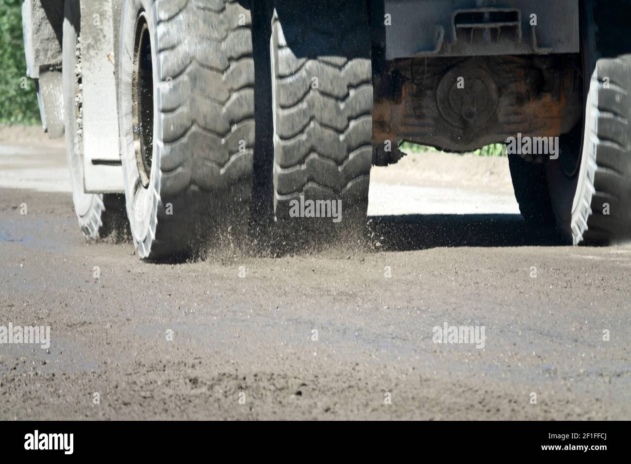 Juggernaut. Pit dump truck, large-capacity dump truck rides on a gravel ...