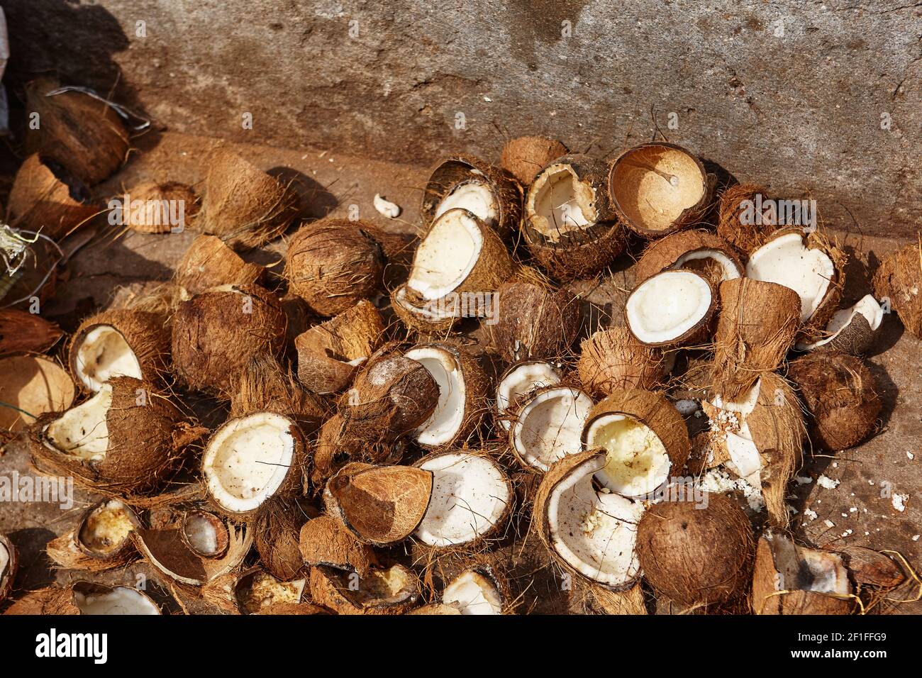 Split coconut shells at a market in Mumbai, India Stock Photo - Alamy