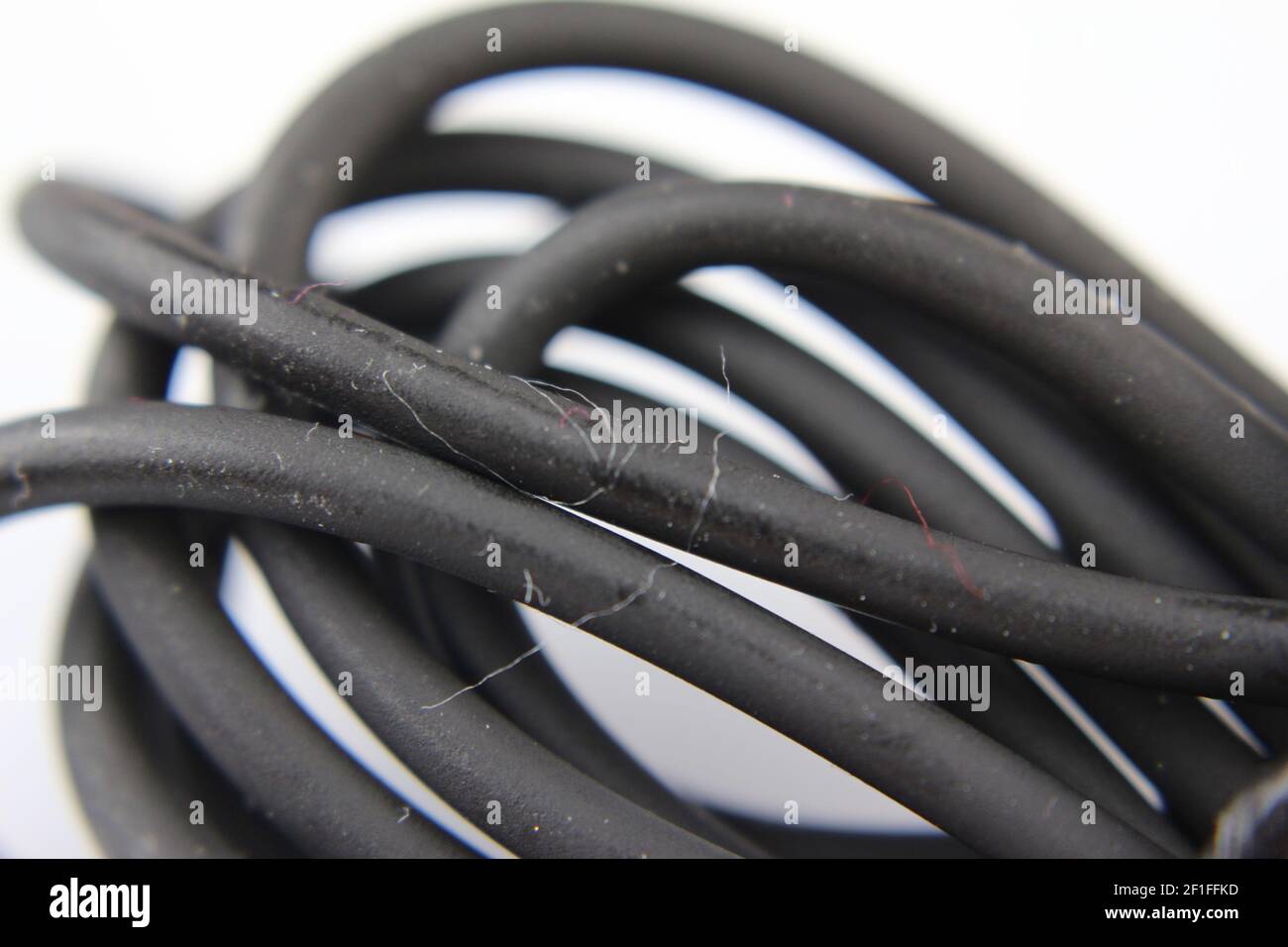 Electronic car connection cable, such as dvd player. Coiled and shown ...