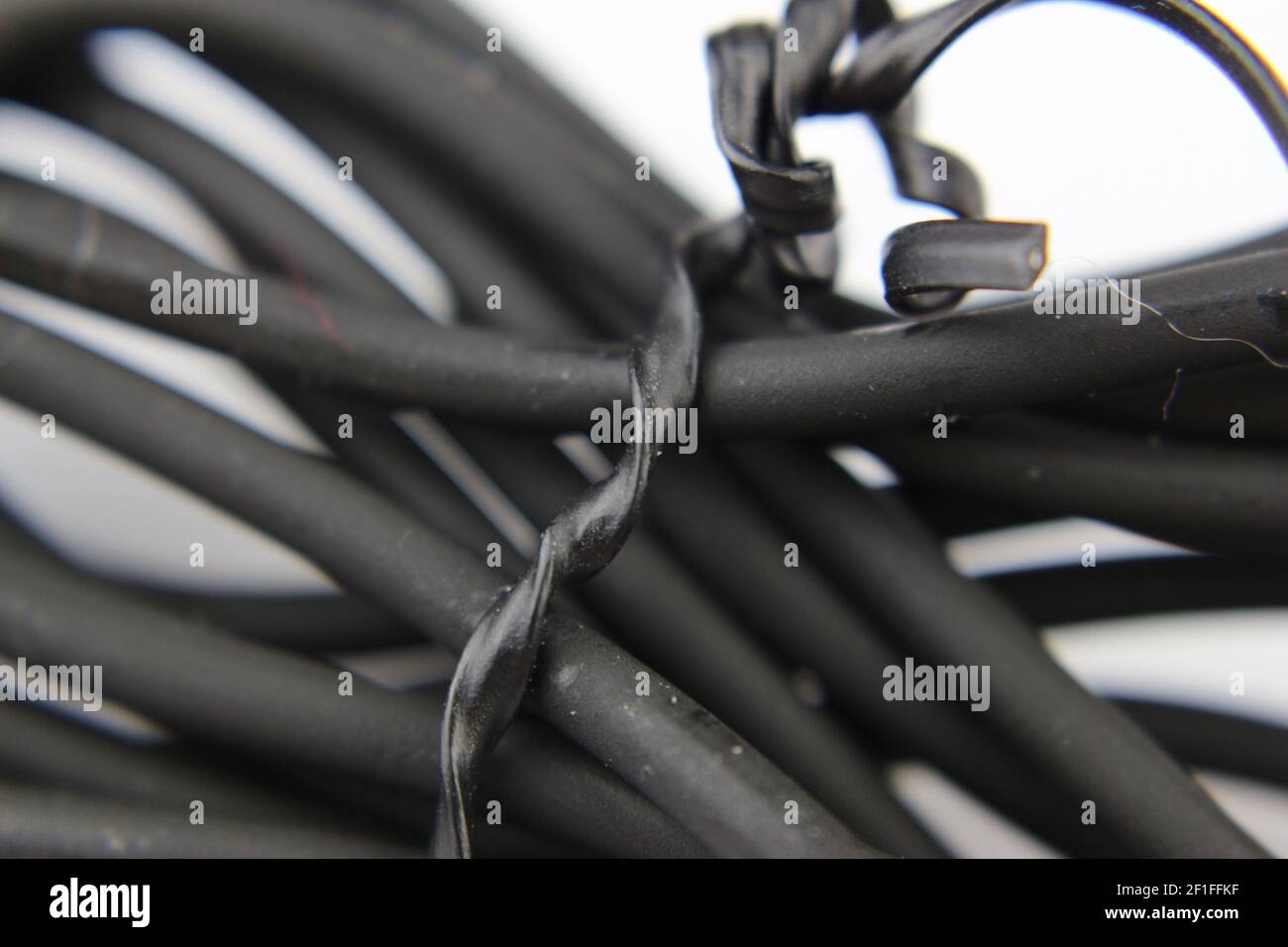 Electronic car connection cable, such as dvd player. Coiled and shown ...