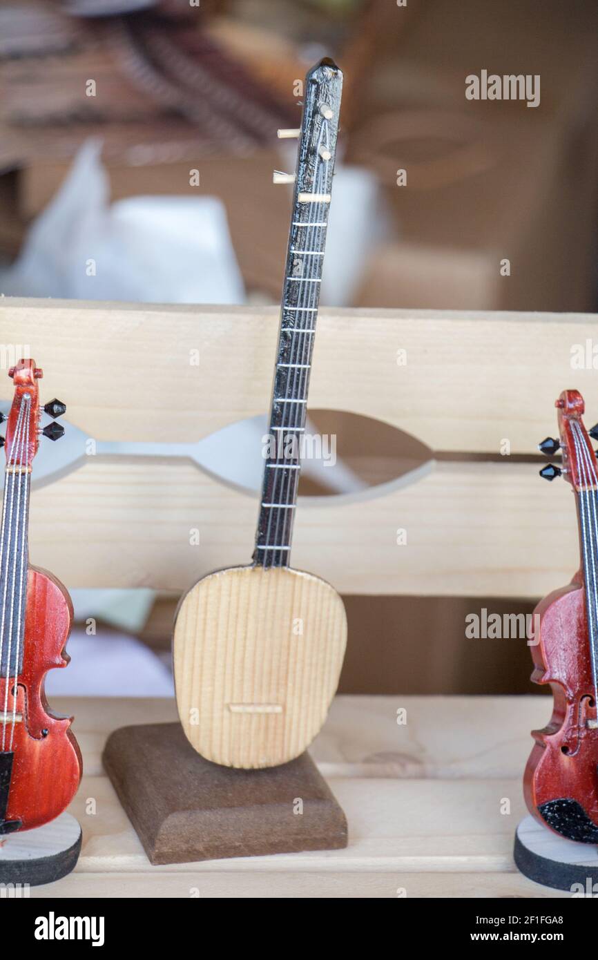 Set of models of musical instruments made of wood Stock Photo - Alamy