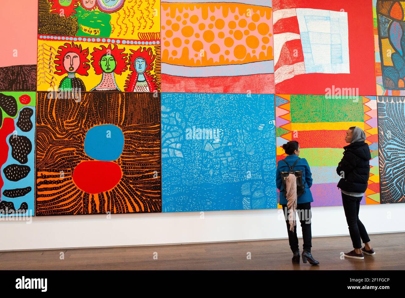 People look at the 'My Eternal Soul Paintings' created by Yayoi Kusama ...