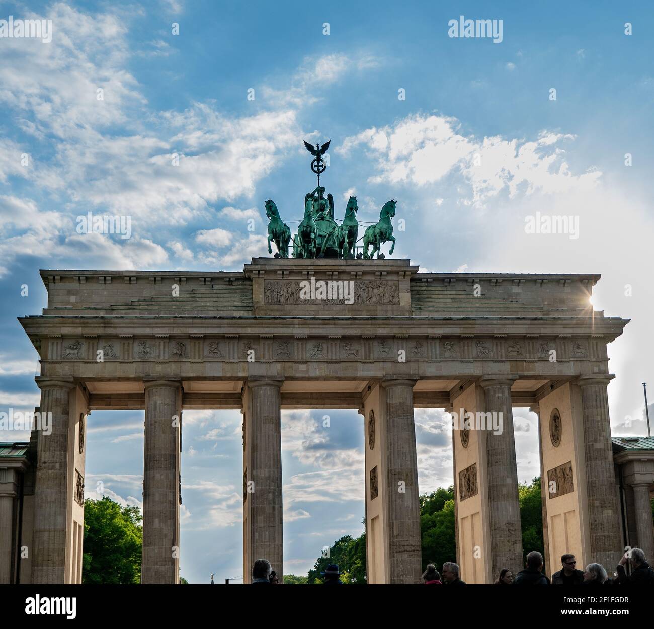 Brandenburg gate - the most famous symbol of Berlin. Sunny day and a ...