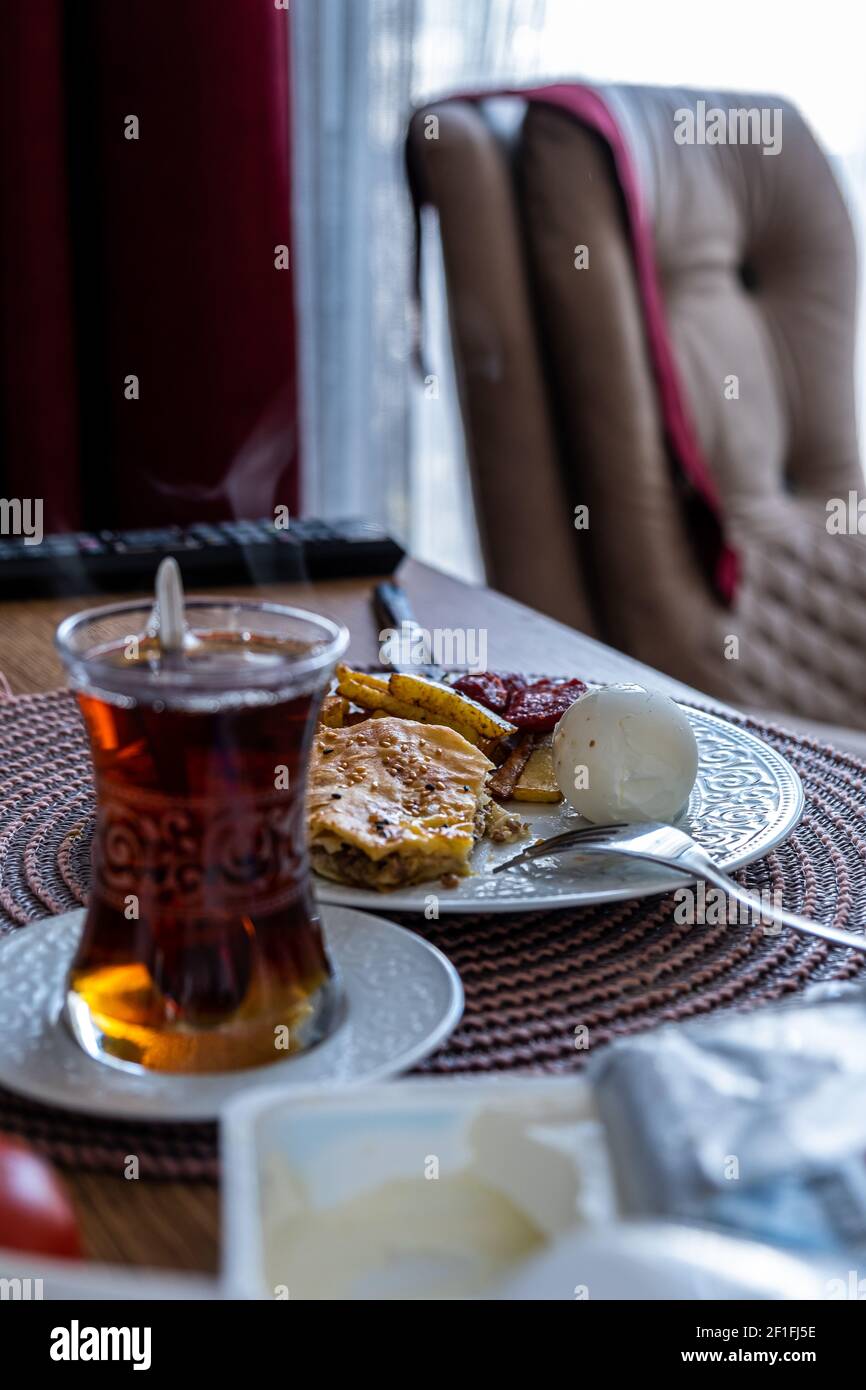 Breakfast with omelette, egg, cheese and tea Stock Photo - Alamy